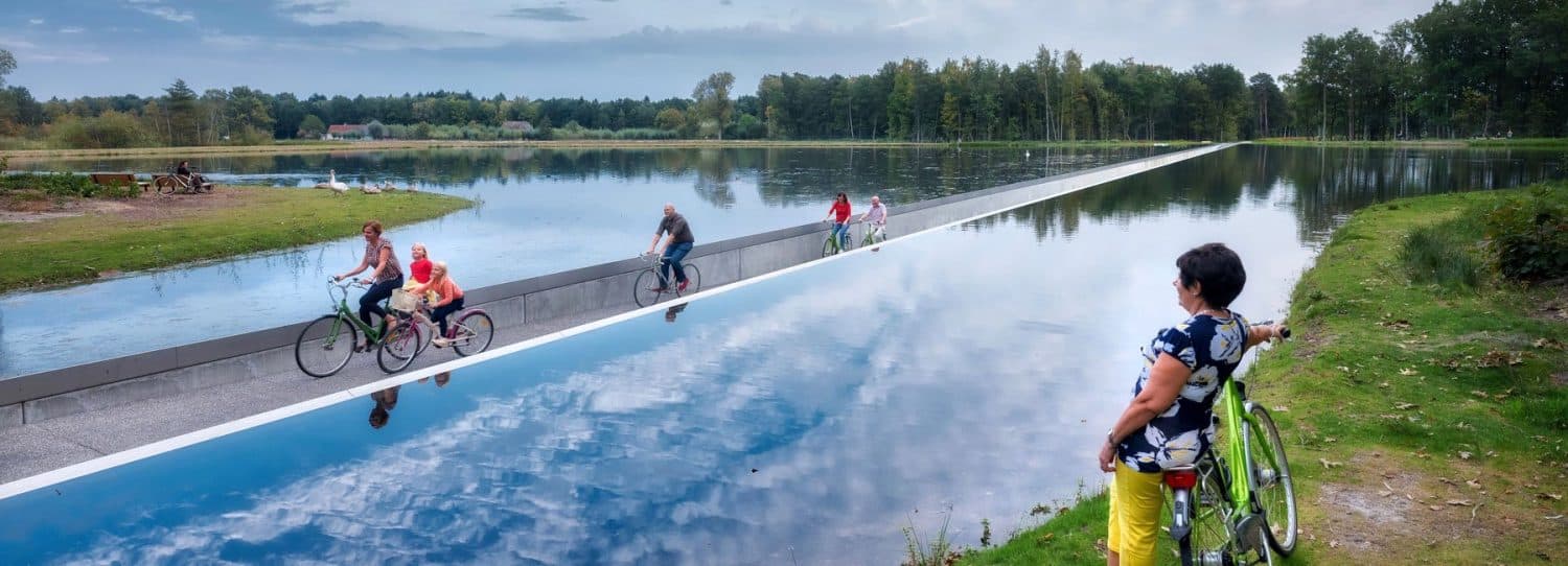 A Cycle Path Cut Directly Through a Lake in Belgium | Moss and Fog
