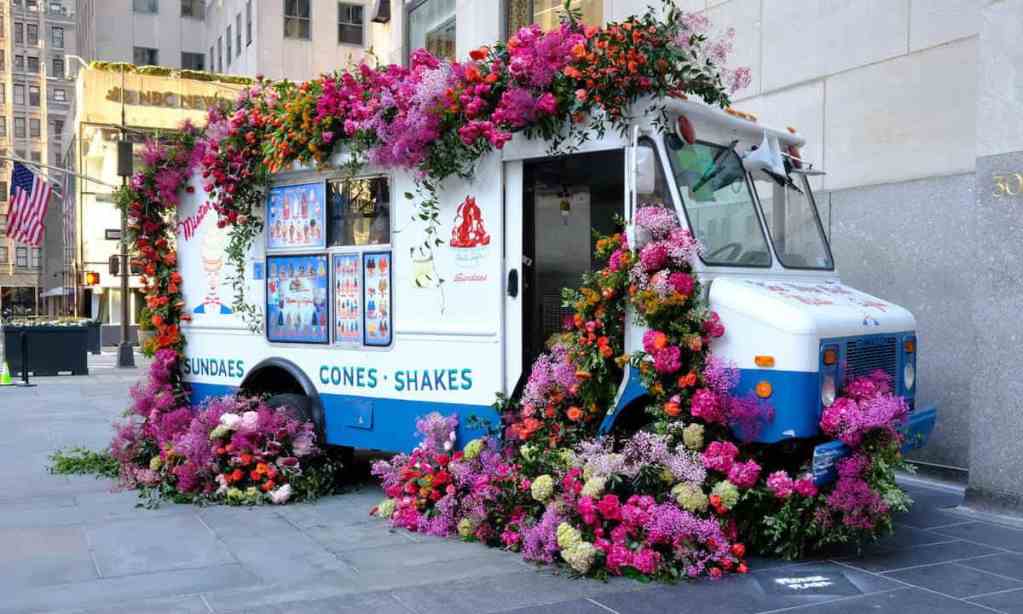 An Ice Cream Truck Overflowing With Flowers Moss And Fog