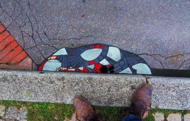 From Crack to Canvas - Street Artist Fixes Holes in Pavement with ...