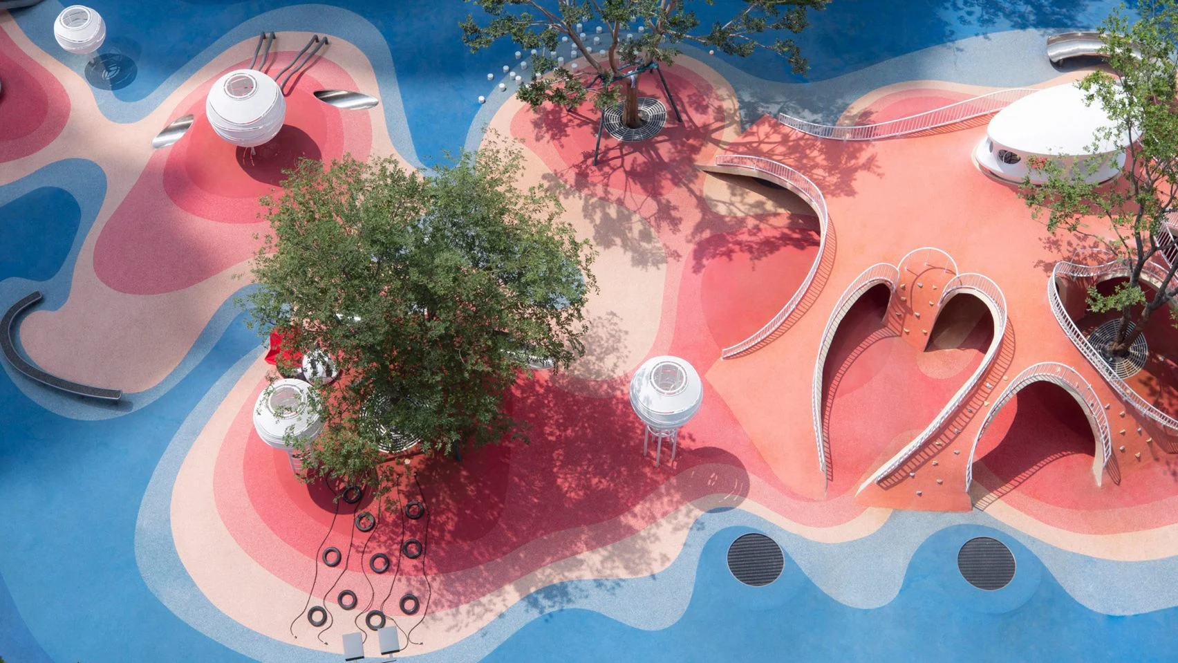 Red Dunes Playtopia, a Marvelously Colorful and Undulating Playground ...