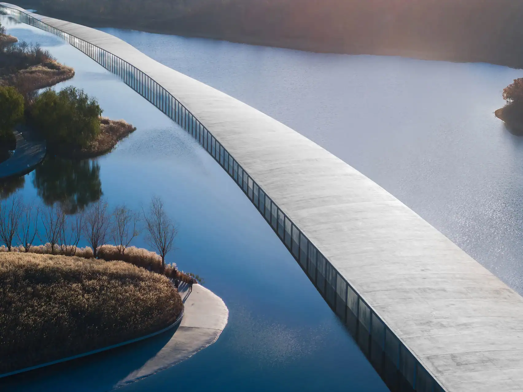 Kilometer Long Museum Emerging from a Lake in China – Moss and Fog